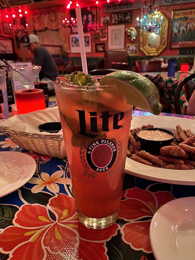 The kind of drink that makes you forget your troubles and remember why limes were invented – served in a glass that's seen its share of good times.