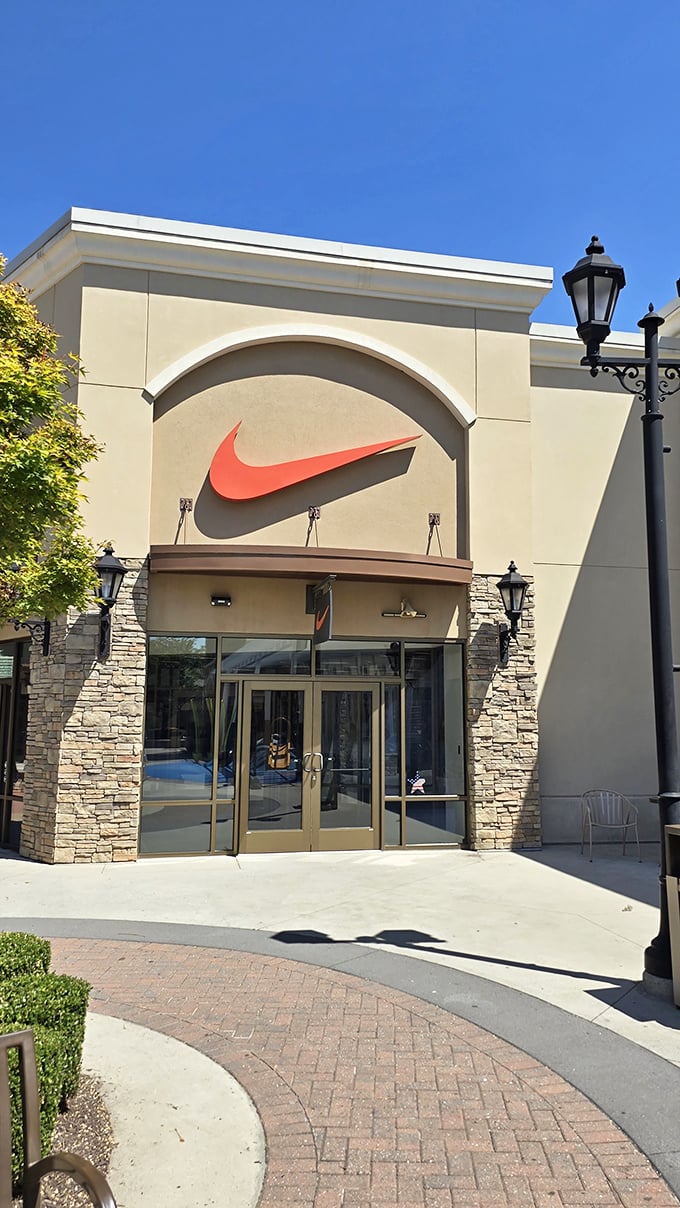 The Nike swoosh—larger than life and beckoning like an old friend saying, "These running shoes are 40% off. You're welcome."