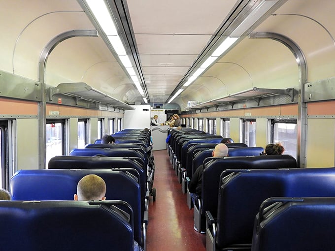 Modern train interiors with vintage charm—where you can actually stretch out without apologizing to your neighbor's kneecaps for existing.