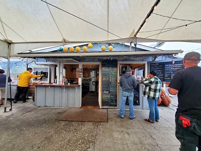 The order window at Sea Pal Cove, where magic happens and deep-fried cheesecake orders are placed with zero judgment.