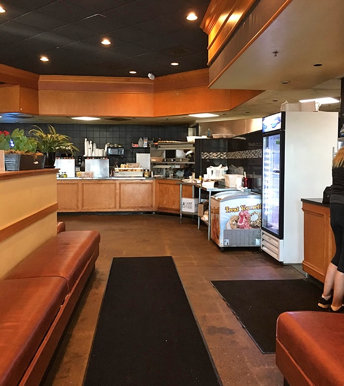 The open kitchen layout lets you witness culinary magic happening in real-time—like watching a delicious reality show with guaranteed happy endings.
