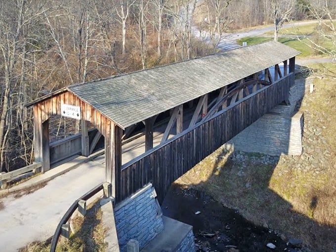 A bird's-eye view reveals how perfectly the bridge nestles into its surroundings, as if the landscape and structure grew together.