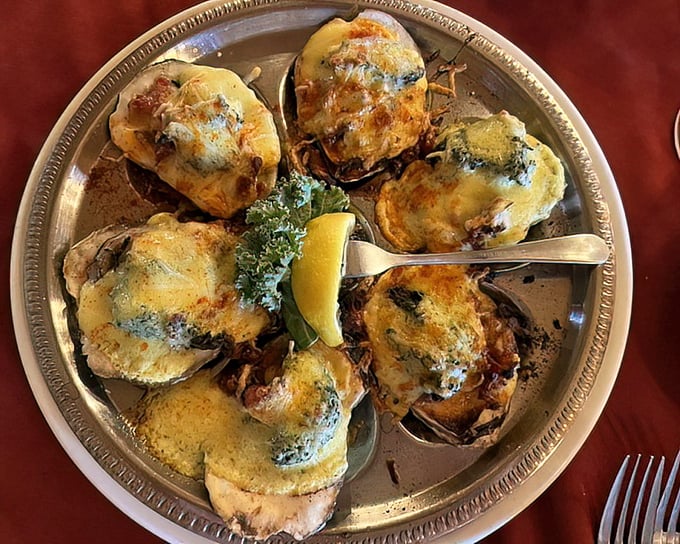 Oysters Rockefeller—where seafood meets decadence. Like the oysters got dressed up for a night at the opera and decided to bring cheese.
