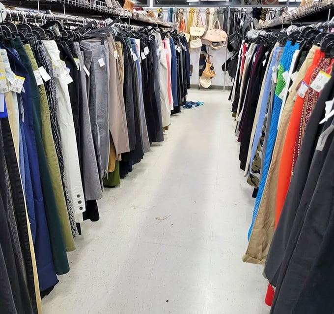 The pants aisle stretches like an endless horizon of possibilities – somewhere in there is the perfect pair of jeans.
