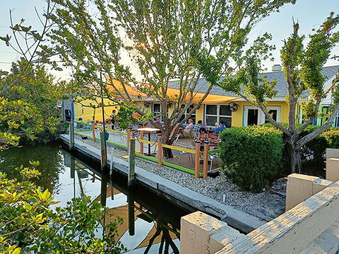 Waterfront dining at its finest—where conversations flow as easily as the tide and sunset views come complimentary with every meal.