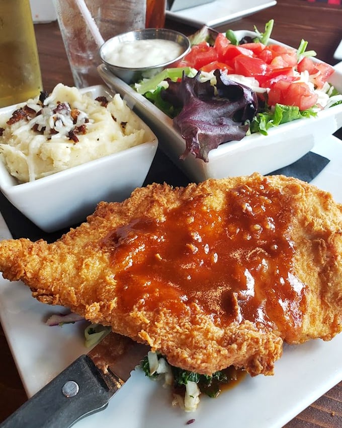This isn't just fried chicken—it's a masterclass in crunch, served with sides that prove vegetables can be more than an obligation.