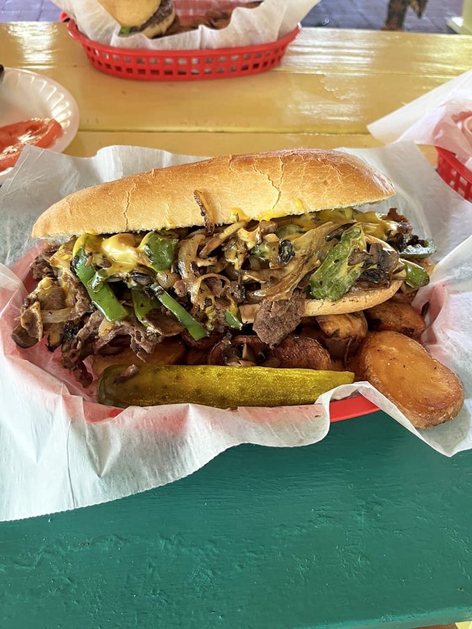 A Philly cheesesteak that would make Rocky climb those steps all over again, with a pickle standing guard like a tart sentinel.