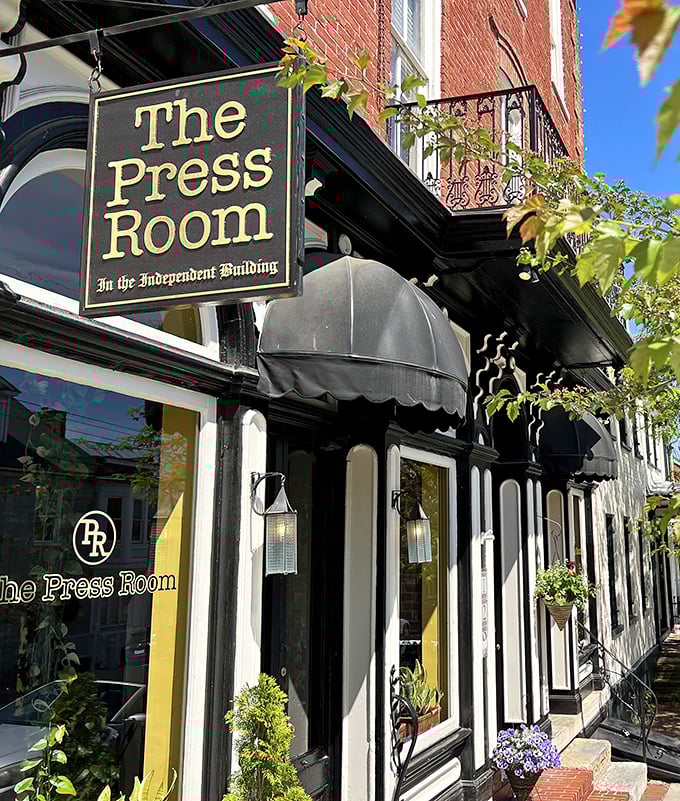 The Press Room's elegant sign and awning promise sophisticated dining in a historic setting—journalism's loss is definitely the culinary world's gain.