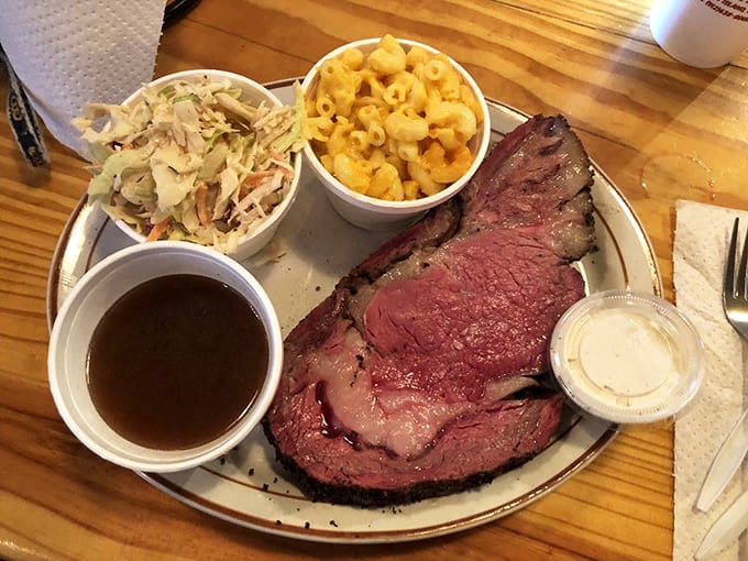 Smoke ring perfection on display. This prime rib has the kind of edge-to-edge pink that makes Texas pitmasters tip their hats in respect.