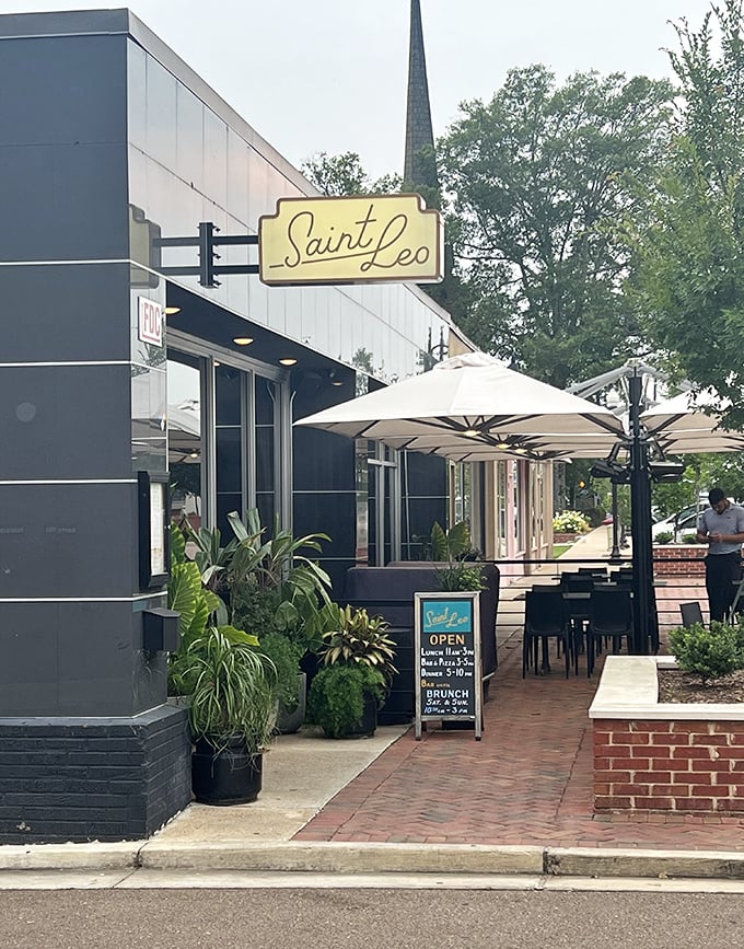 Saint Leo's sleek exterior belies the warmth within—a culinary oasis where outdoor tables invite you to linger over meals worth remembering.