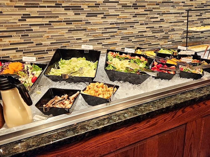 A salad bar that reminds you why buffets became popular in the first place—fresh ingredients waiting patiently on their ice beds for your selection.