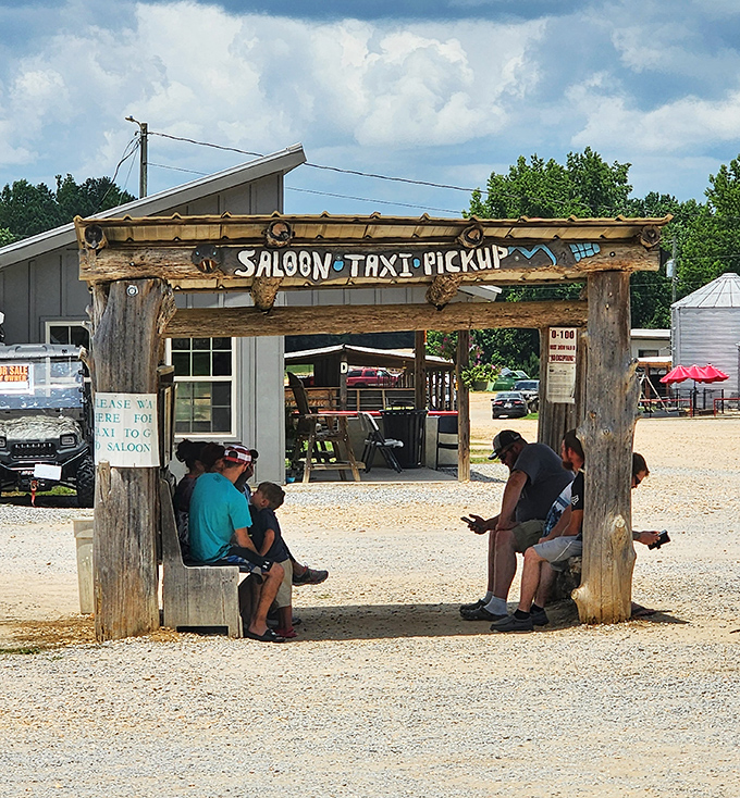 The "Saloon Taxi Pickup" station—where your dining adventure begins with a bumpy ride that's one part hayride, one part time machine to the Old West.