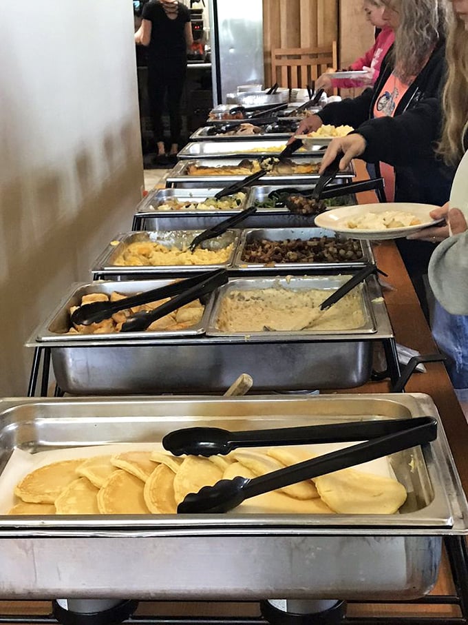 The buffet line promises a choose-your-own-adventure story where every ending involves satisfied sighs and possibly a loosened belt notch.