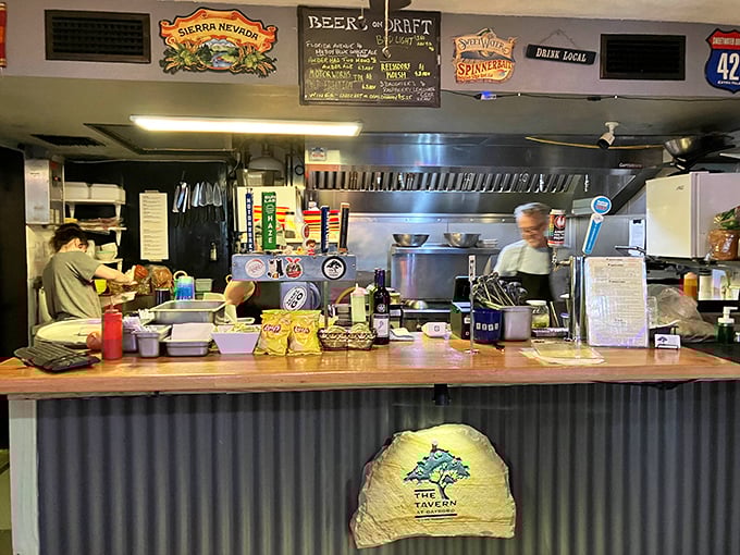 Where the magic happens—a kitchen counter that's seen more grouper than most fishing boats. Those taps aren't just dispensing beer; they're pouring liquid Florida.