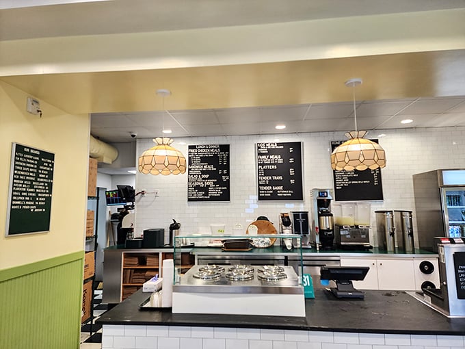 Stained glass pendant lamps cast a warm glow over the ordering area. This isn't fast food—it's food worth slowing down for.