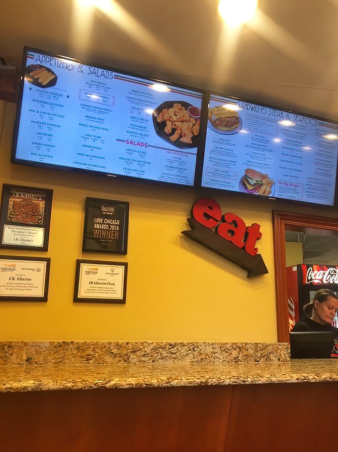 Awards on the wall and a giant "eat" sign—as if you needed any more encouragement to do exactly that.