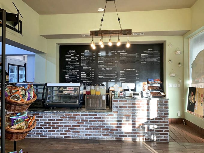 The command center of sandwich creation – brick counter, chalkboard menu, and pendant lighting that says "we take bread seriously here."