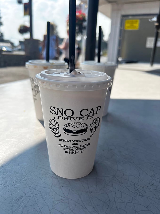 The milkshake cup says it all—homemade ice cream transformed into sippable bliss, complete with the straw-challenging thickness that separates the amateurs from pros.