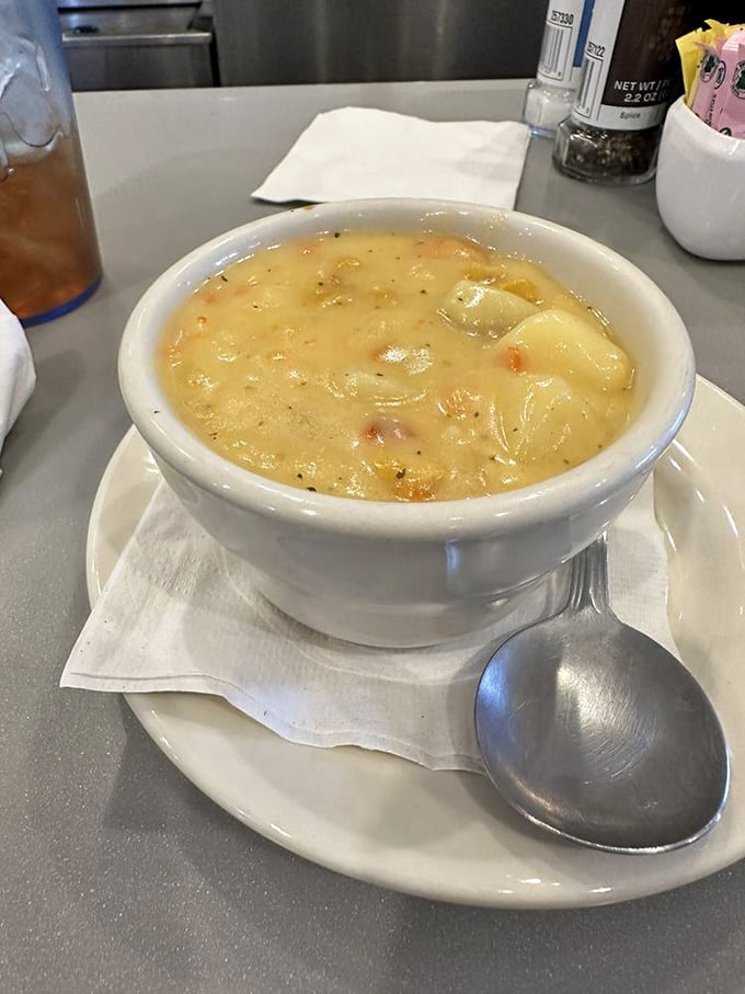 A bowl of chowder that doesn't need fancy garnishes to tell its story—just honest ingredients speaking volumes in every spoonful.