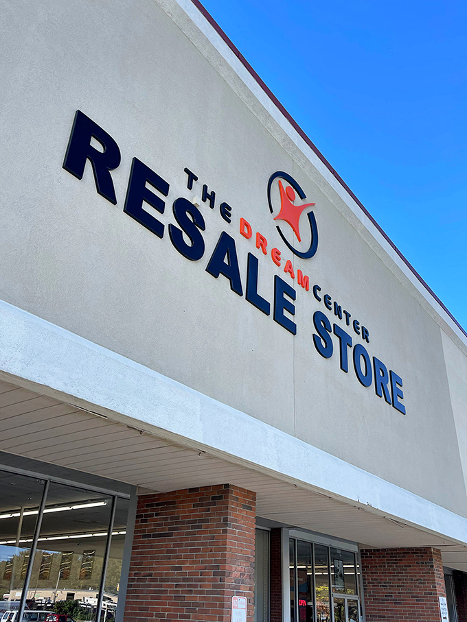 The sign says it all – dreams of affordable shopping come true beneath these bold letters.