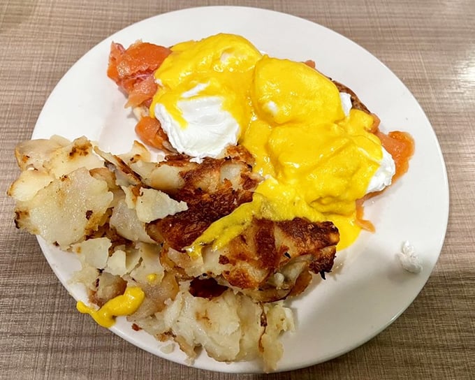 Eggs Benedict with salmon—where breakfast luxury meets omega-3s in a morning romance that's worth getting out of bed for.