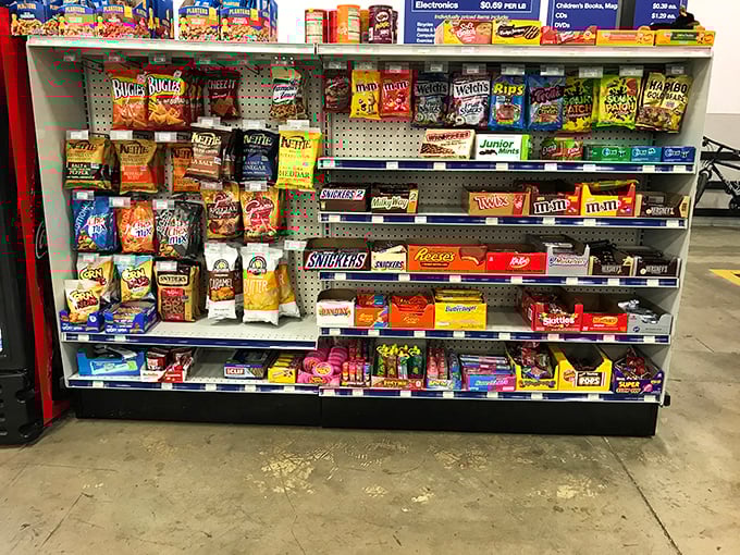 The snack aisle proves even outlets need fuel – treasure hunting works up an appetite.