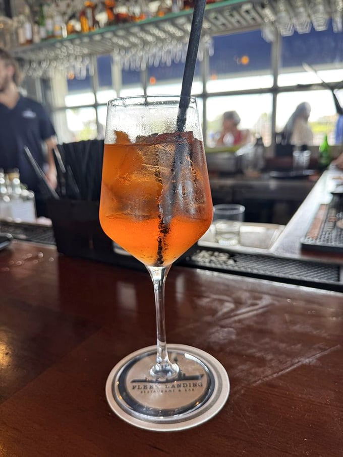 This spritz cocktail sparkles like Charleston Harbor at sunset—served in a glass that makes everything feel like a special occasion.