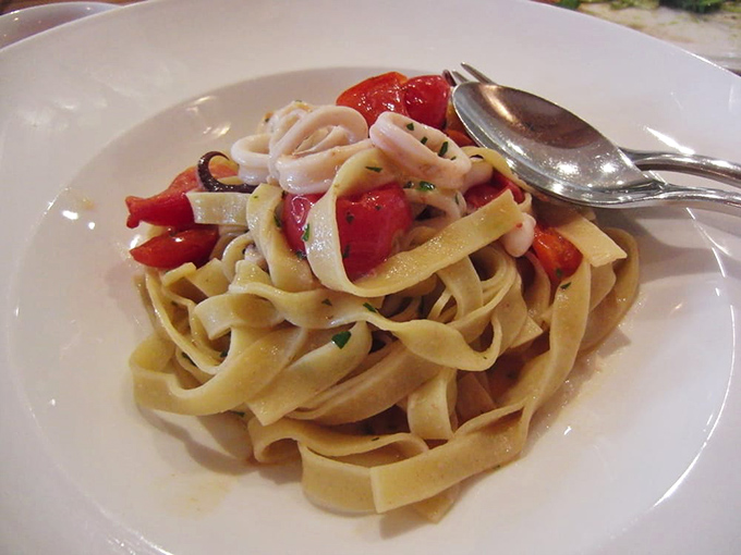 Pasta ribbons dancing with tomatoes—so simple yet so sophisticated, like Audrey Hepburn in culinary form.