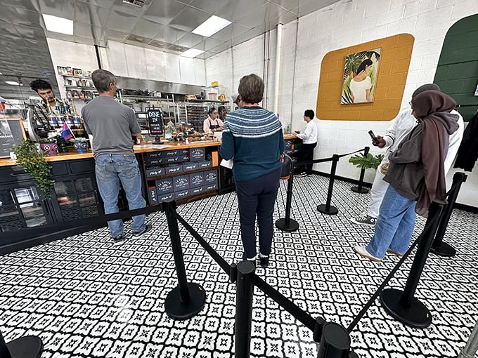 The line forms with purpose—these patrons know that good things come to those who wait, and great things come to those who arrive early.