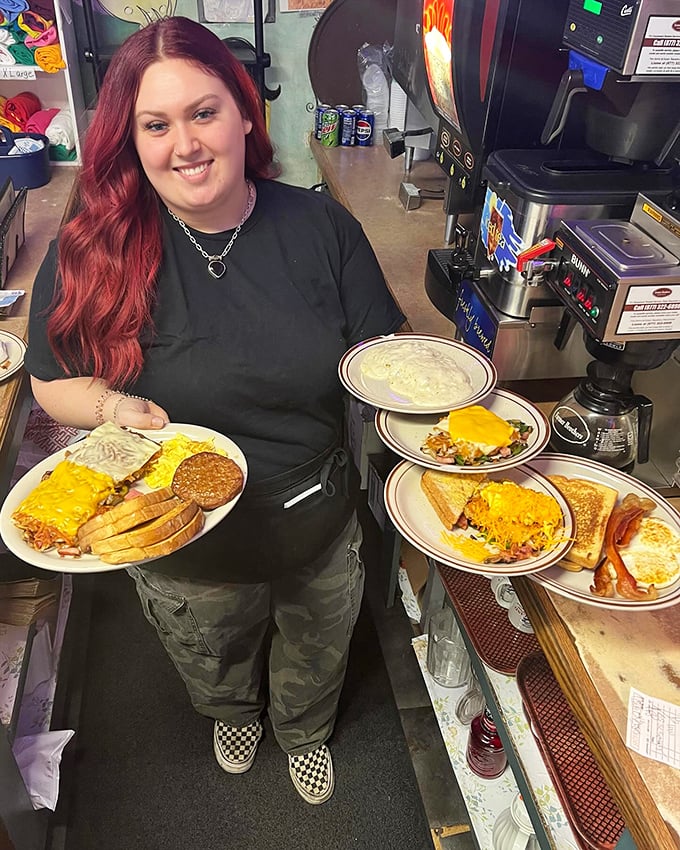 Servers balancing multiple plates with the skill of circus performers—each one a complete breakfast masterpiece destined to make someone's morning.
