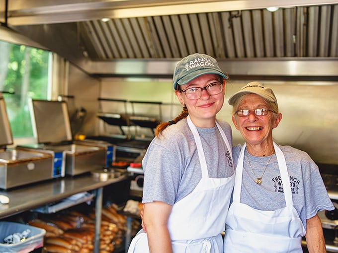 The kitchen crew—where the magic happens. Generations of hot dog wisdom passed down like family heirlooms, resulting in Pennsylvania's perfect comfort food.