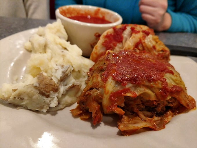 Comfort food that grandmother would approve of—stuffed cabbage with a side of nostalgia and mashed potatoes.