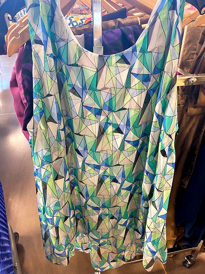 This geometric print tank isn't just summer clothing—it's wearable art that would cost triple at a boutique. Someone's loss is your statement-making gain.