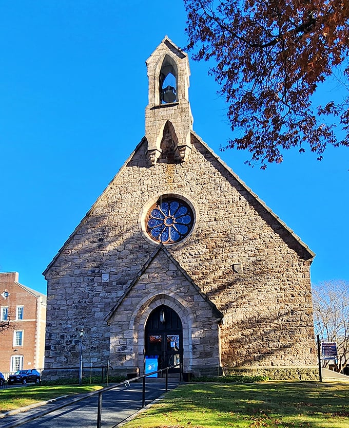 This stone church looks like it was plucked from the English countryside—a spiritual sanctuary with stained glass that's survived more history than your grandmother's recipes.