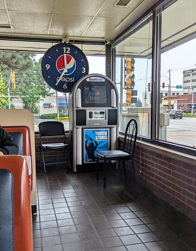 The vintage Pepsi clock and jukebox corner—where time stands still but the music keeps changing.