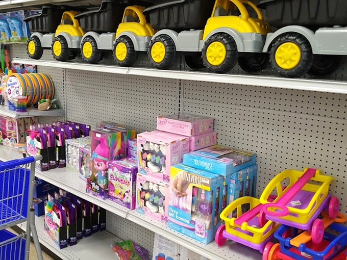 Childhood joy lined up in neat rows – where imagination meets affordability in a rainbow of plastic construction vehicles.