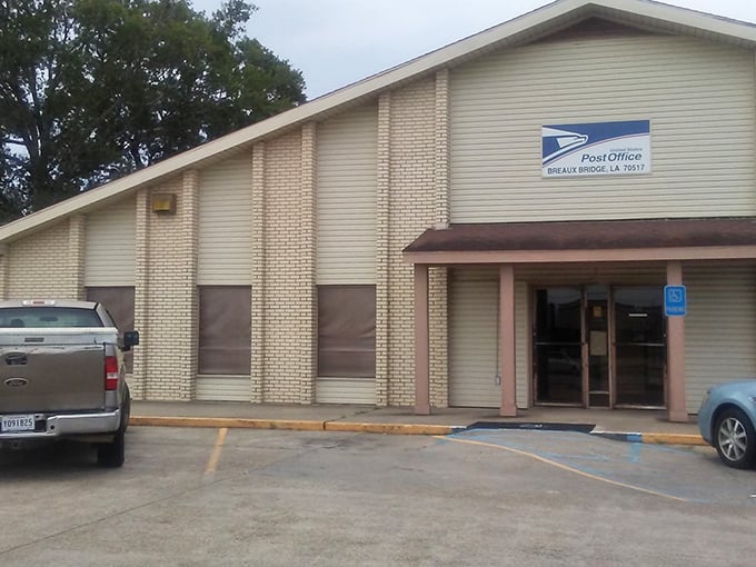 The post office – where small-town gossip travels faster than any Priority Mail package ever could.