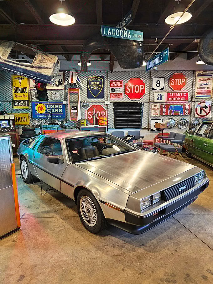 Great Scott! A DeLorean DMC-12 holding court among vintage road signs—no flux capacitor visible, but time travel happens here anyway.