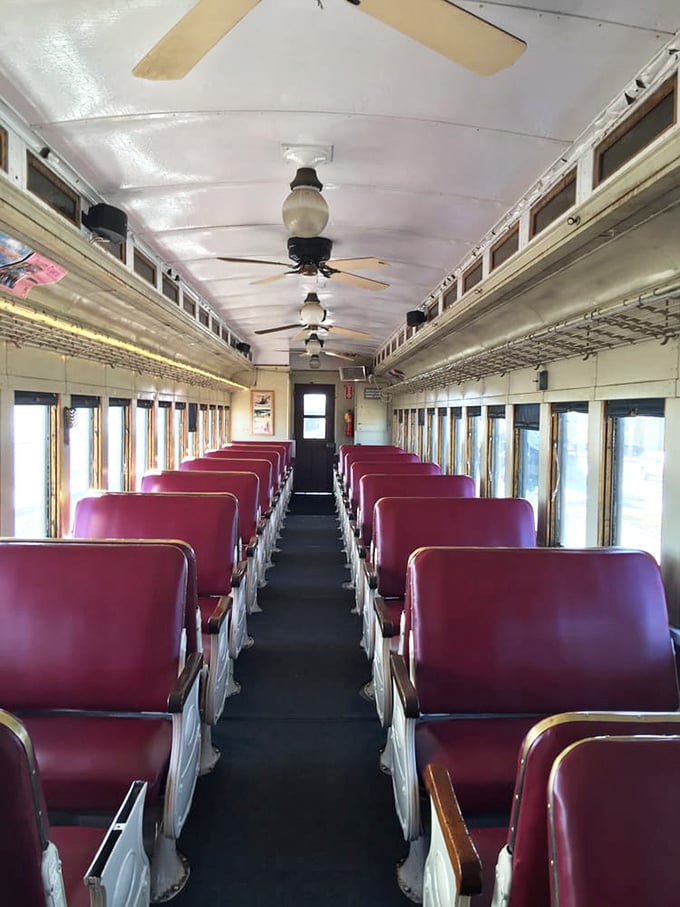 These plush red seats aren't just comfortable—they're time machines upholstered in memories waiting to be made.