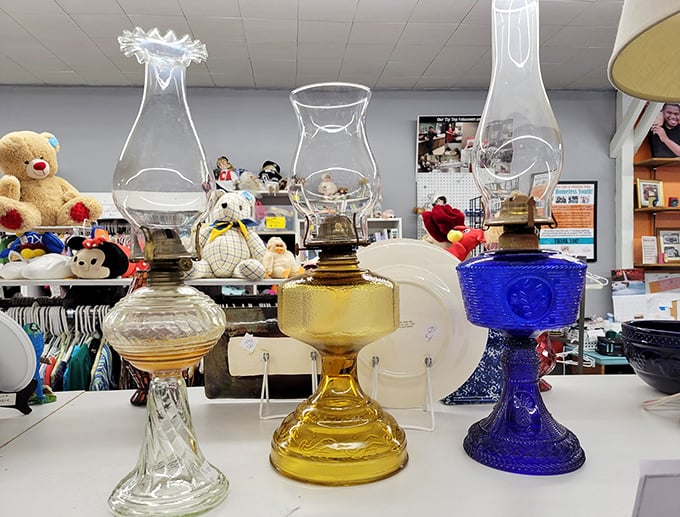 Vintage oil lamps in clear, amber and cobalt blue – illuminating pieces of American domestic history at bargain prices.