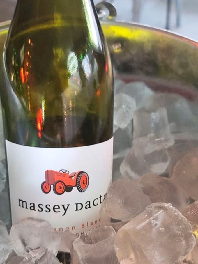 Wine chilling on ice—because sometimes pizza deserves to be elevated from a meal to an occasion worth celebrating.