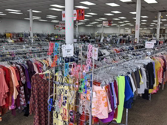 Rainbow rows of possibility—each garment rack contains someone's future favorite outfit just waiting to be discovered.