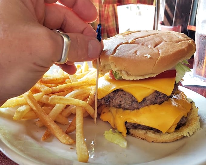 The Double Zip Burger with cheese – where two patties meet their destiny under a blanket of perfectly melted American cheese.