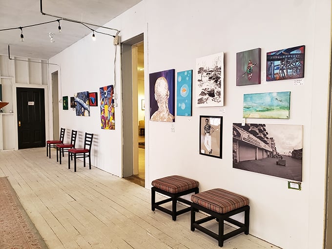 An art gallery within an antique store—like finding an unexpected room in your house that's been there all along.
