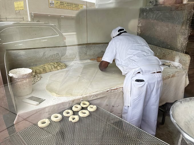 Artistry in motion as dough becomes donuts. Like watching Michelangelo, if Michelangelo worked in flour instead of marble.