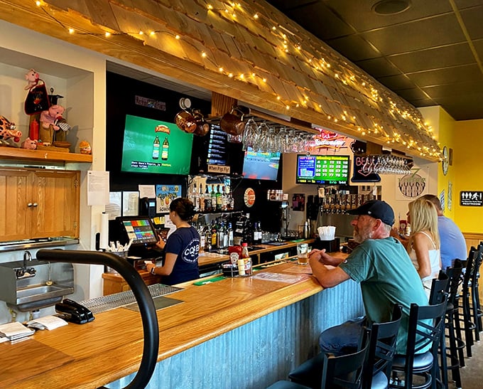 The bar area glows with promise, like a beacon for the barbecue faithful. Those string lights aren't decoration—they're celebration illumination.