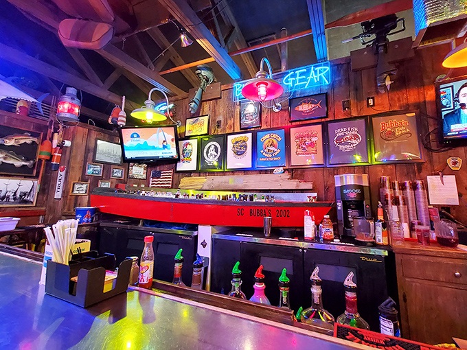 A bar that doesn't need mixologists or fancy cocktail menus – just cold beer, friendly service, and enough neon to guide you home.