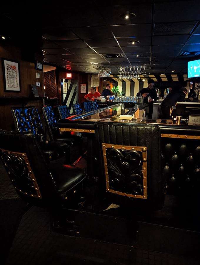 The bar area – where leather-backed stools have witnessed countless first dates, business deals, and "just one more" nightcaps.