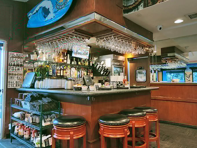 Not just any bar—a breakfast bar where morning cocktails and coffee coexist in perfect harmony under surfboard supervision.