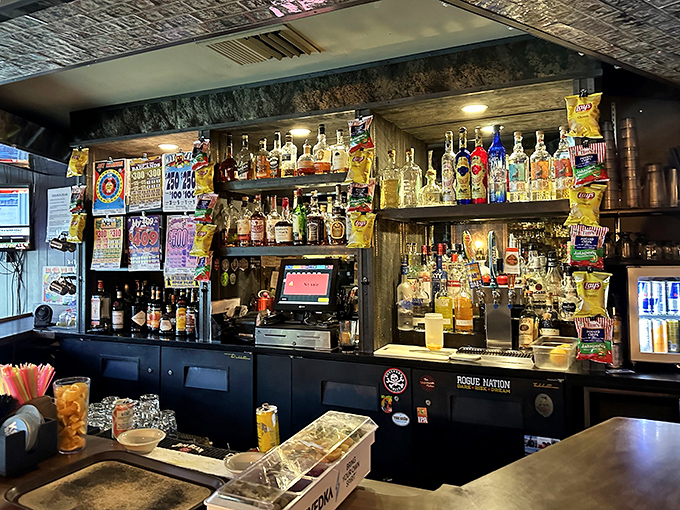 The cocktail lounge side of Knapp's reveals its evening personality—bottles lined up like old friends ready to join your conversation.